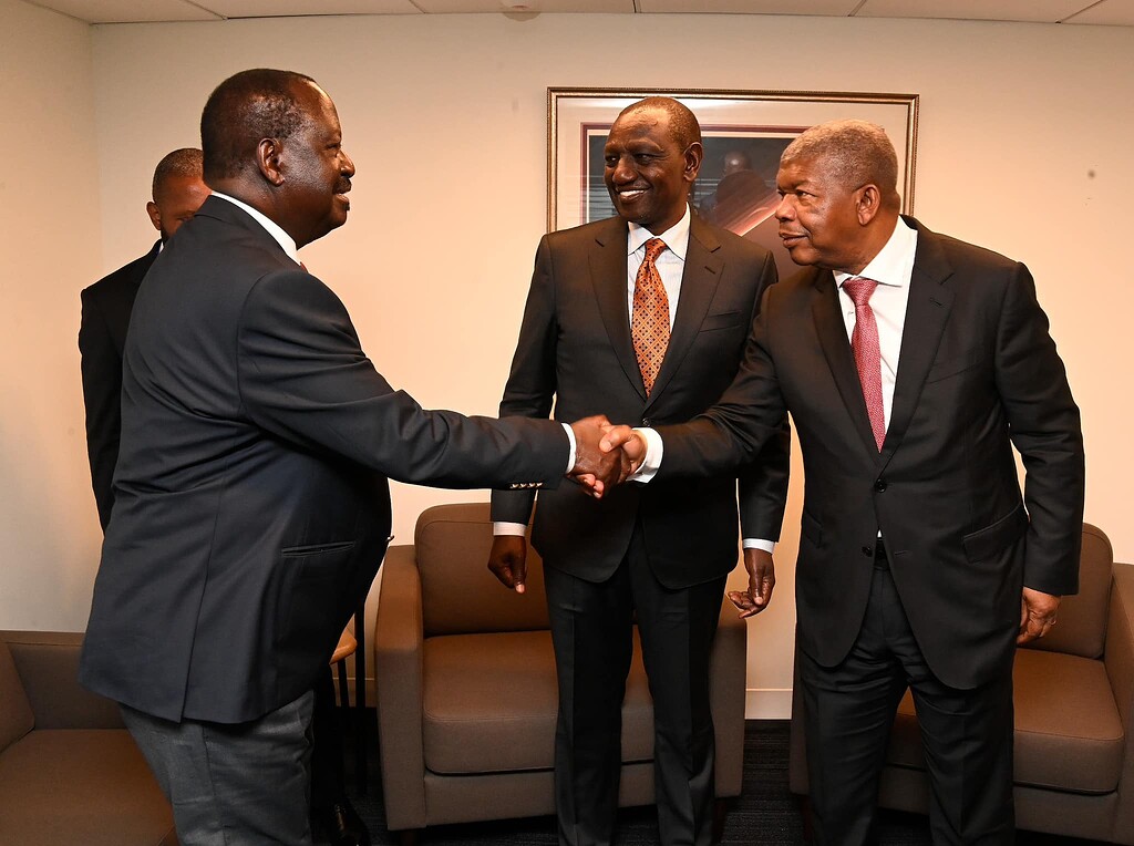 Handshake brothers meet President of Angola. Power is sweet. Rao is the ...